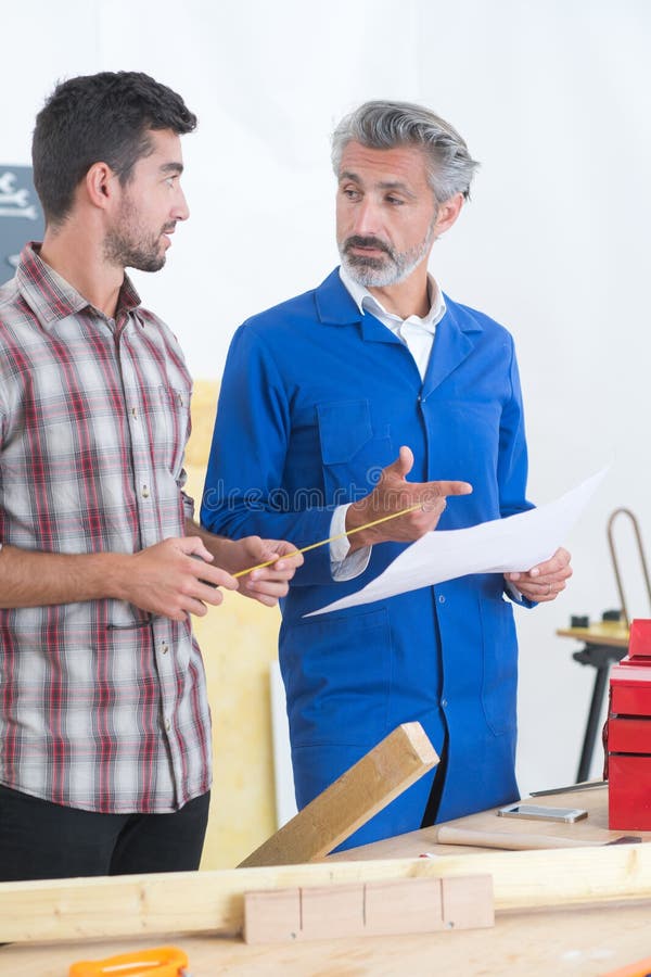 Carpentry Apprentice and Mentor Stock Image - Image of carpenter, teen ...