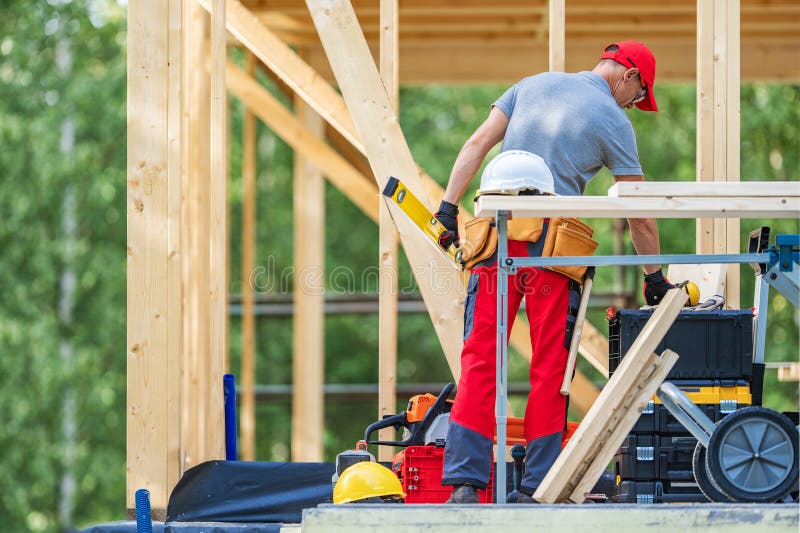 Carpentry Contractor Worker in His 40s and the Construction Site Stock ...