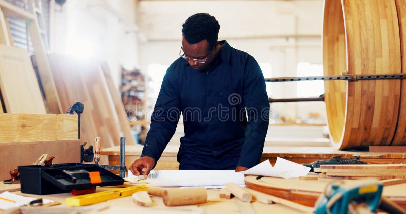 Carpentry, Documents and Industry with Black Man in Workshop for ...