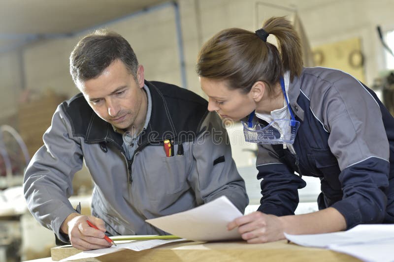 Carpentry Instructor Teaching Trainee Stock Image - Image of instructor ...