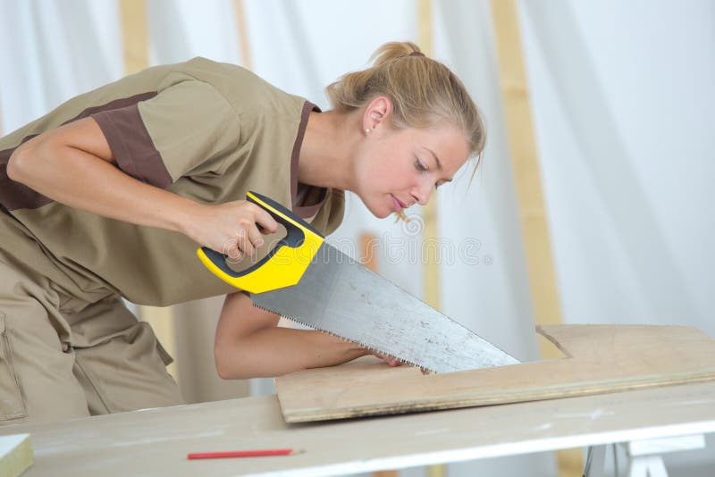 Carpentry job for women stock image. Image of improvement - 258797689
