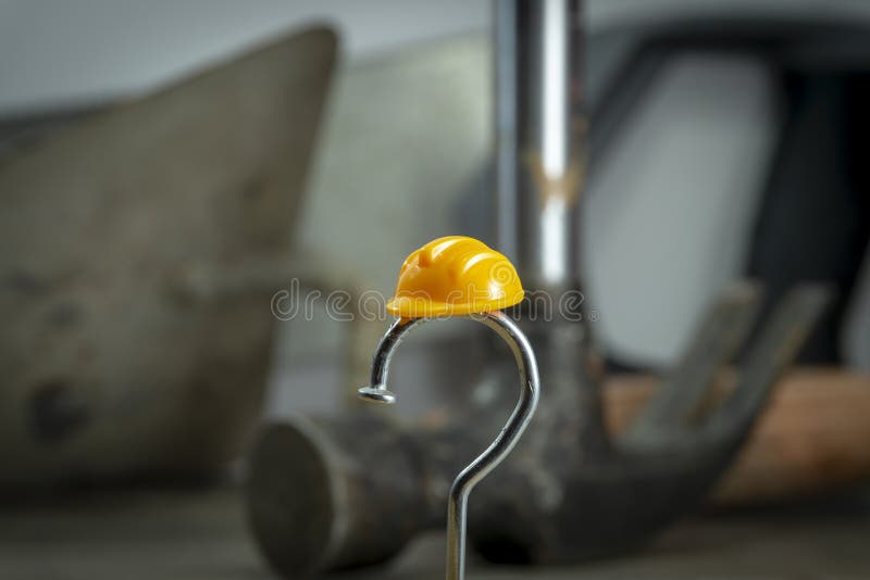 Carpentry Nail Shaped As Question Mark and Helmet Stock Photo - Image ...