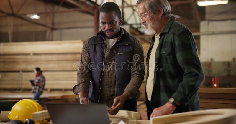 Carpentry, Teamwork and Men with Tablet for Planning, Collaboration or ...