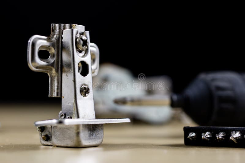 Carpentry Tools and Accessories on a Workshop Table. Hinges and Stock ...