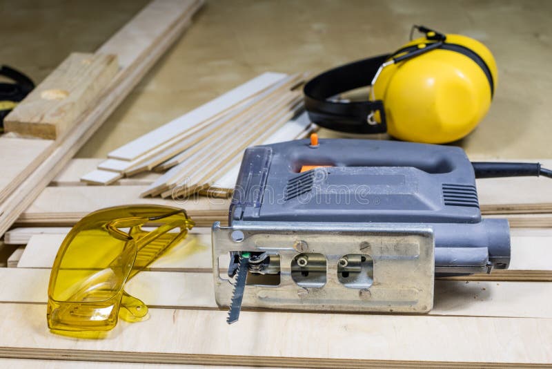 Carpentry Tools on a Wooden Workshop Table. Saw and Other Carpentry ...