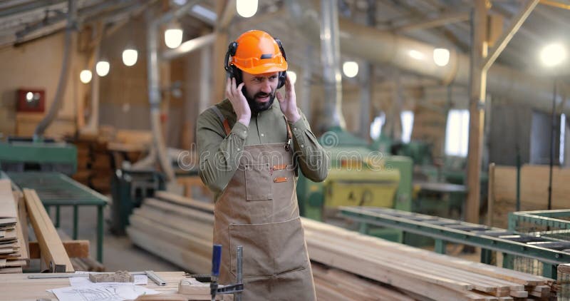 Carpentry Worker Having Fun at the Factory Stock Video - Video of ...