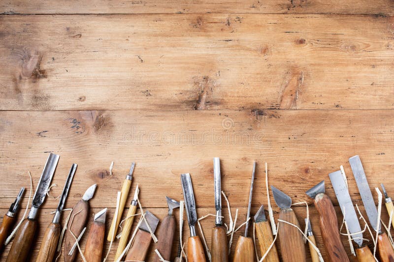 Carpentry Workshop Desk with Set of Different Handmade Carving Tools ...