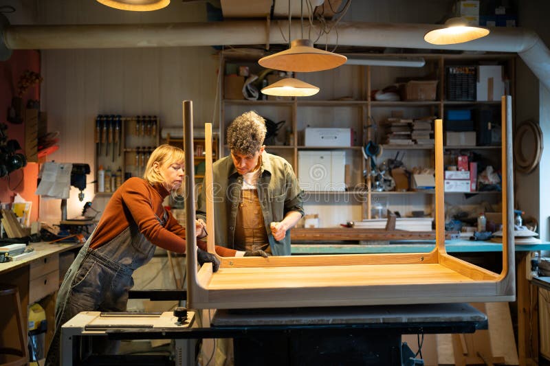 Carpentry Workshop, Craftsmen Working Together. Woman and Man ...