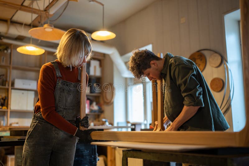 Carpentry Workshop, Craftsmen Working Together. Woman and Man ...