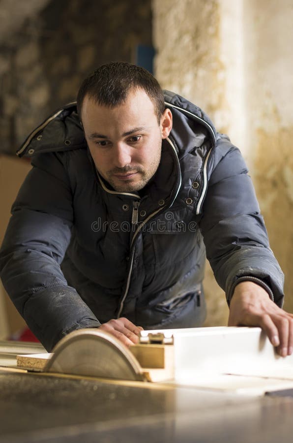 Carpentry workshop routine stock image. Image of handsome - 88560481
