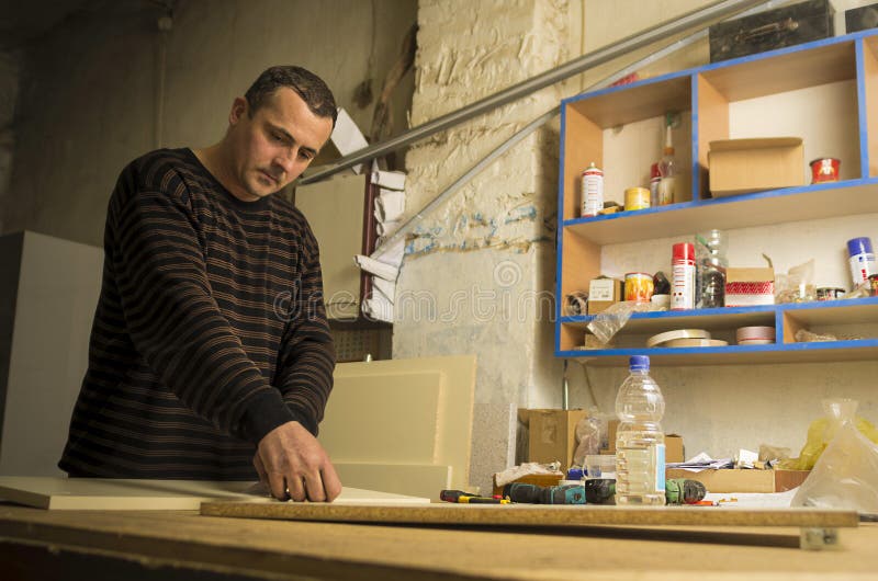 Carpentry workshop routine stock image. Image of furniture - 88560575