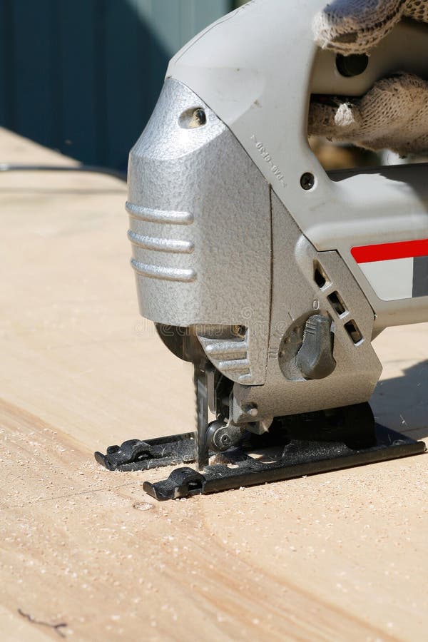 Man Nailing Plywood Floor with Nail Gun Stock Photo - Image of builder ...