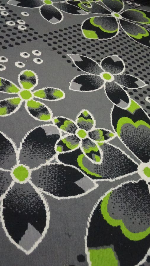 A Carpet with Floral and Green Leaf Patterns. Truly Eye-catching Stock ...