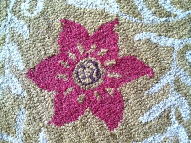 Carpet Texture with a Pink Flower in the Center Stock Photo - Image of ...