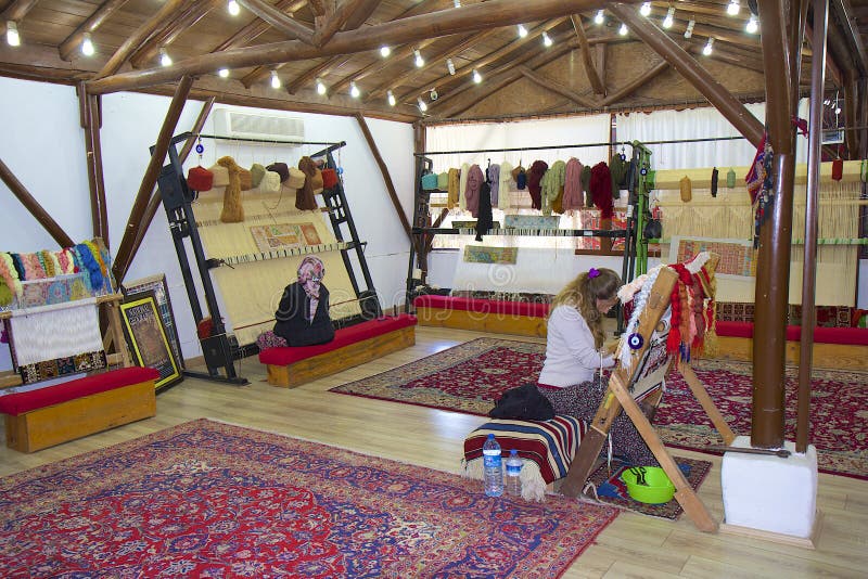 Carpet weaving in Turkey editorial stock photo. Image of weaving - 69208038