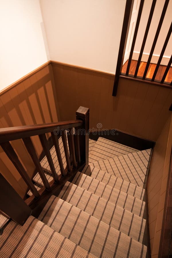Carpeted U-shaped Staircase in a Luxury Home Stock Image - Image of ...