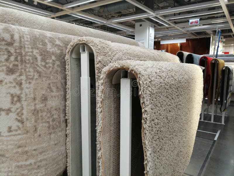 Carpets Assortment in the Store on the Shelf Stock Photo - Image of ...