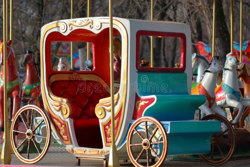 Carriage in Carousel in Morning Sun Stock Photo - Image of circle, ride ...
