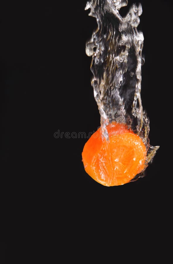 Carrot and drops of water stock image. Image of light - 23128785