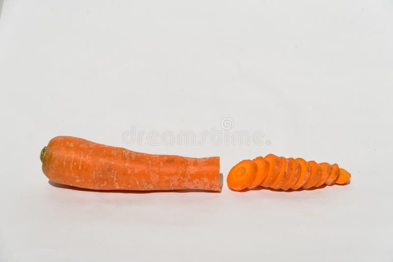 Carrot Half Whole and Half Sliced on the Table Stock Photo - Image of ...