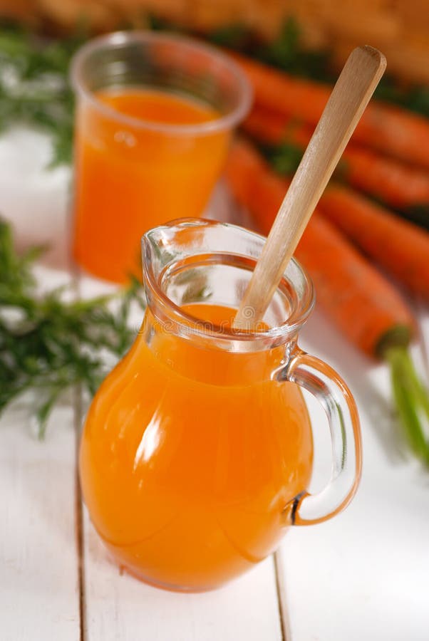 Carrot Juice in the Pitcher Stock Image - Image of color, healthy: 35815889