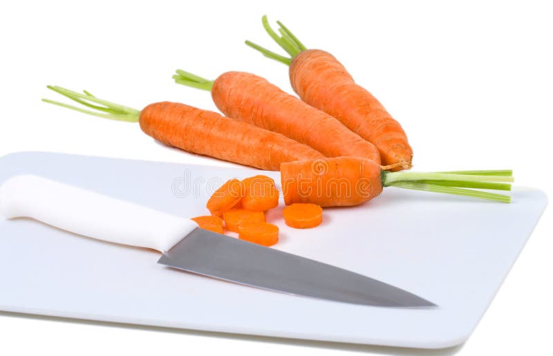 Carrot and Knife on Cutting Board Isolated on White Stock Image - Image ...