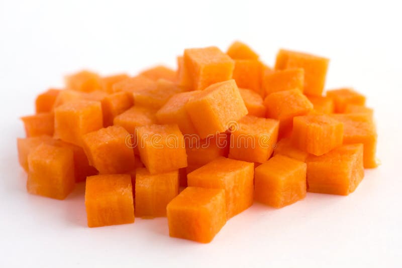 Carrot Neatly Chopped into Cubes Stock Photo - Image of focus, white ...