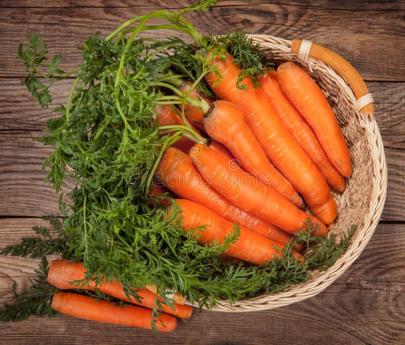 Carrot on the old table stock photo. Image of gardening - 57493244