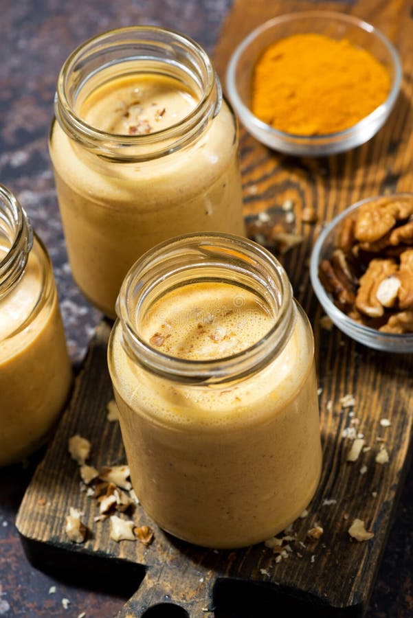 Carrot Smoothies with Turmeric, Vertical Top View Stock Photo - Image ...