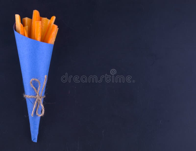 Carrot Sticks in a Blue Lie from Left. Blue Bag Tied with String Stock ...