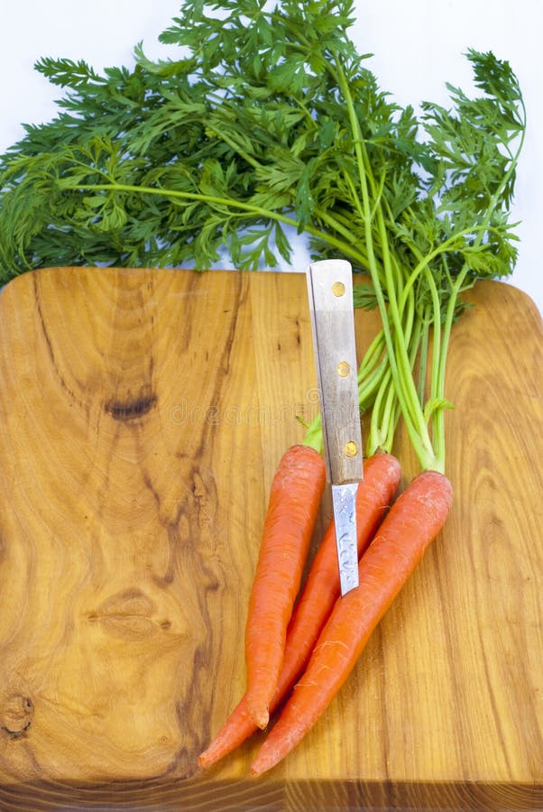 Carrots on the Chopping Block Stock Photo - Image of root, carrots ...