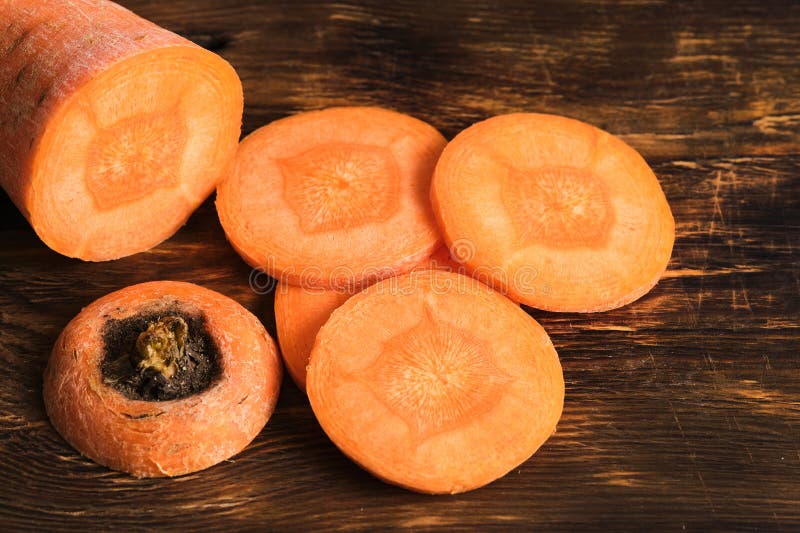 Carrots Cut into Rings on a Wooden Chopping Board. Stock Photo - Image ...