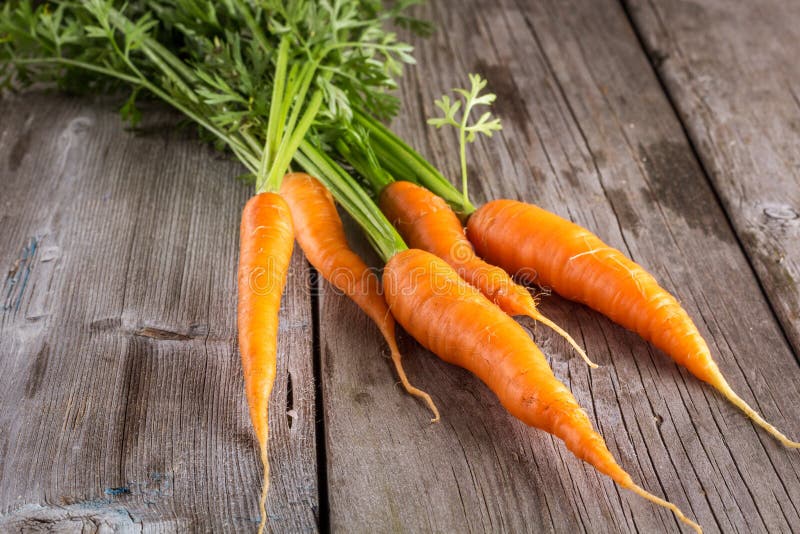 Carrots on old boards stock image. Image of cutting, wooden - 73993117