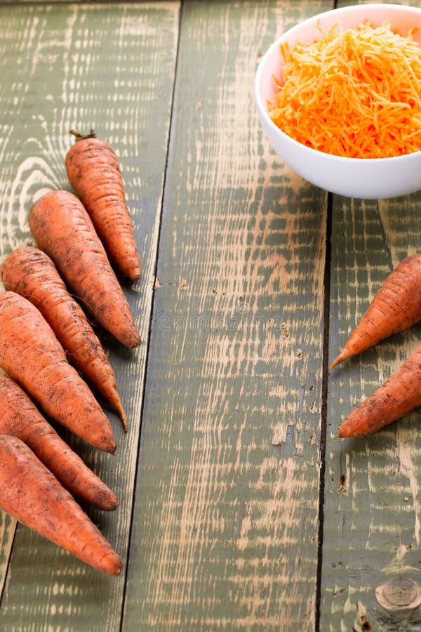 Carrots on an old table stock photo. Image of eating - 60455046