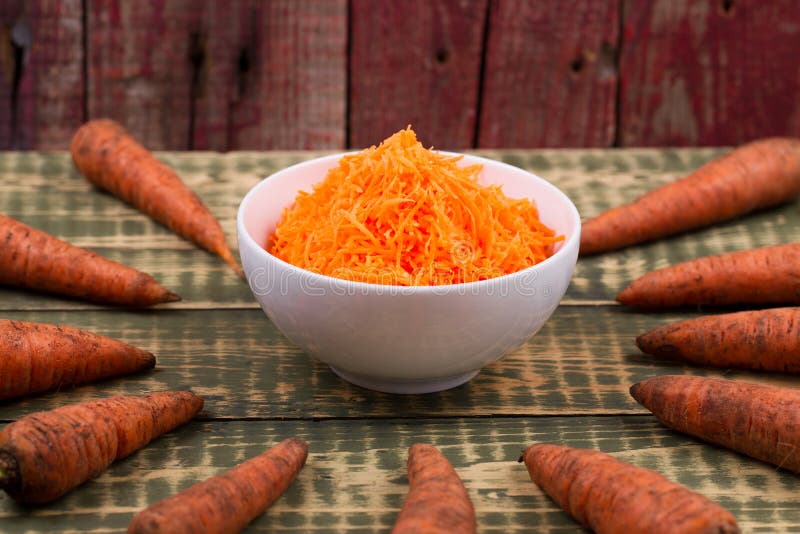 Carrots on an old table stock photo. Image of vitamin - 60455096