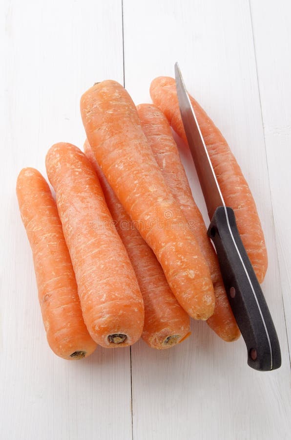 Carrots and a Used Kitchen Knife Stock Photo - Image of utensil ...