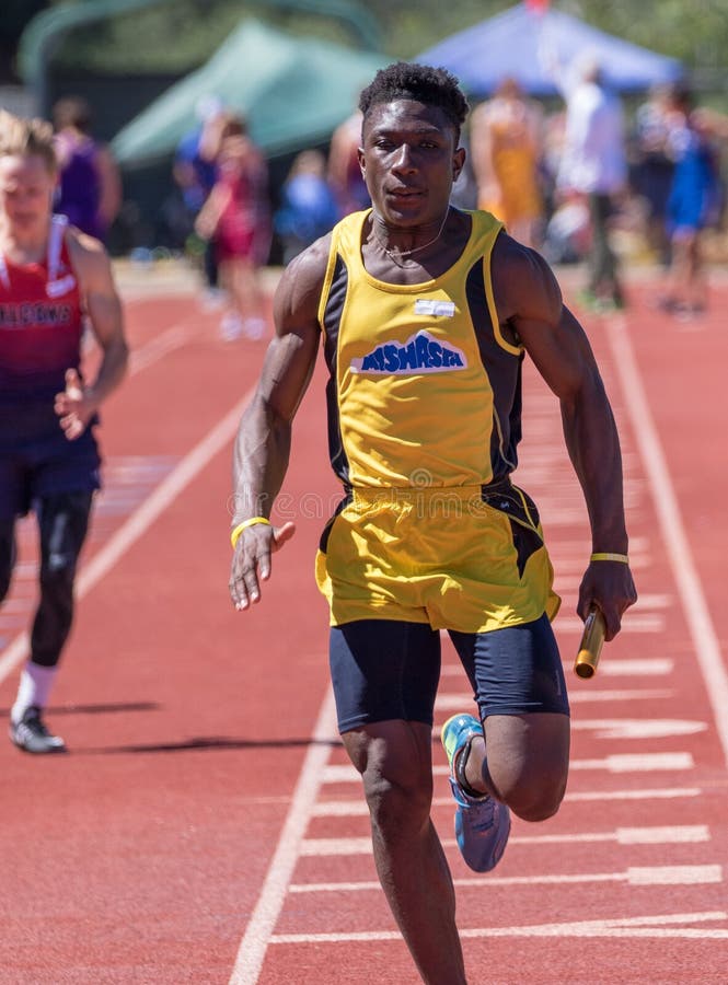 Carrying the Batton editorial stock photo. Image of field - 86268898