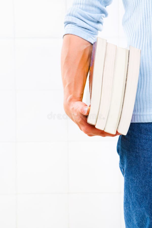 Carrying book stock image. Image of copy, jeans, books - 8476299