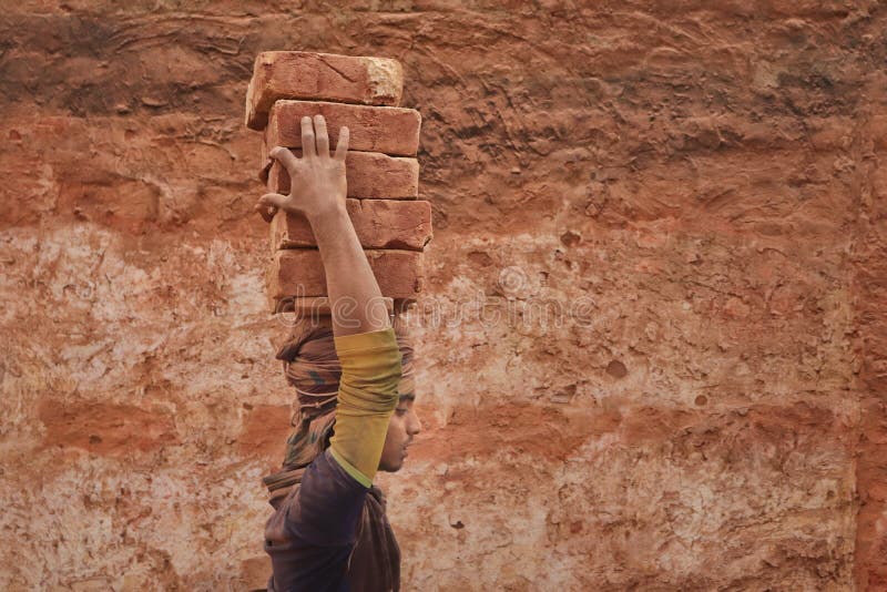 While carrying the bricks editorial image. Image of rock - 179539135