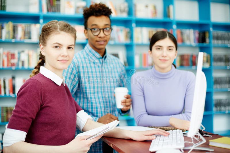 Carrying out computer task stock photo. Image of library - 116446114