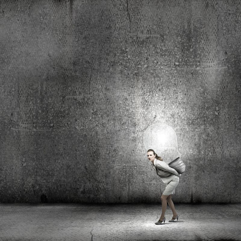 Carrying out an idea stock photo. Image of lightbulb - 45778312