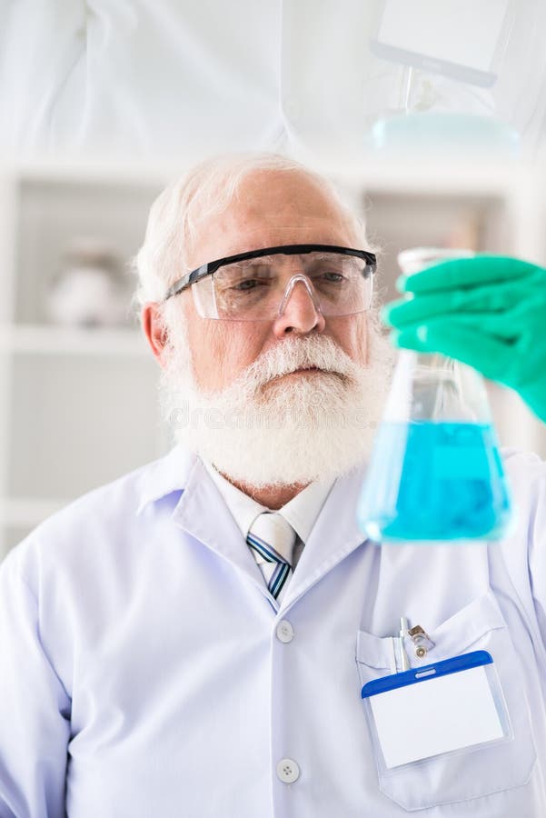 Carrying out research stock photo. Image of reagent, labcoat - 52580874