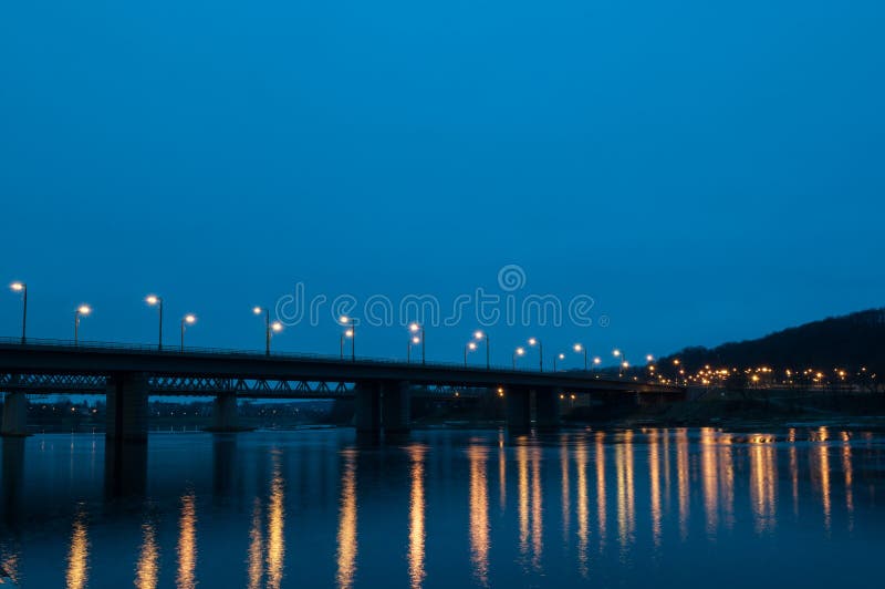Cars` bridge in the lights stock image. Image of reflection - 108022301
