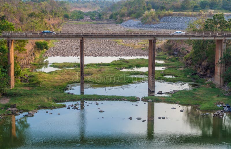 Cars on bridge over river stock image. Image of accelerator - 40765019