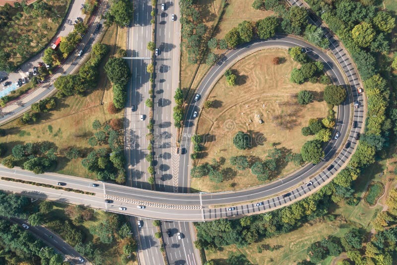 Cars Drive Along Loop Shaped Road Junction Top View. Stock Photo ...