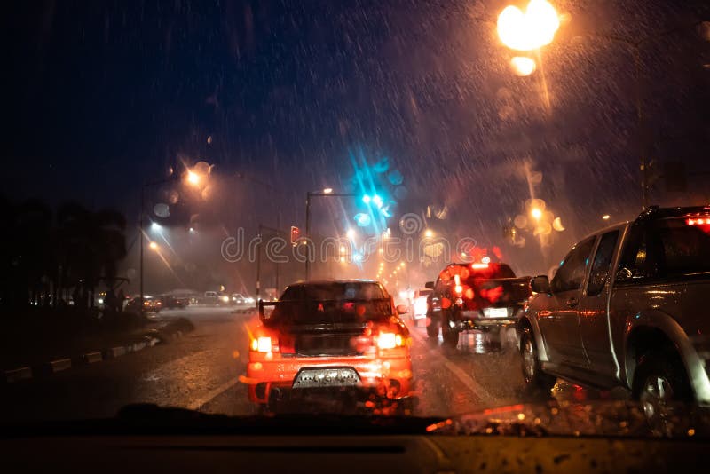 Cars Driving through Rainy at Night Stock Image - Image of city, street ...