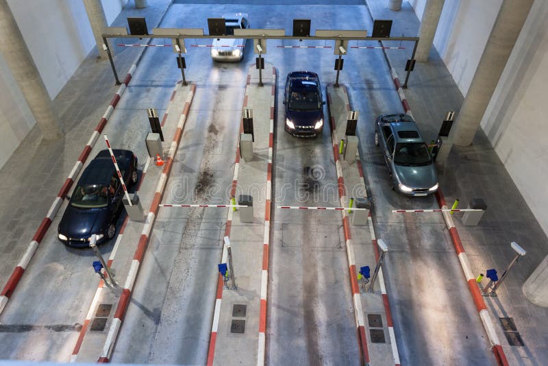Cars Entering Parking Garage Stock Image - Image of parking, paying ...