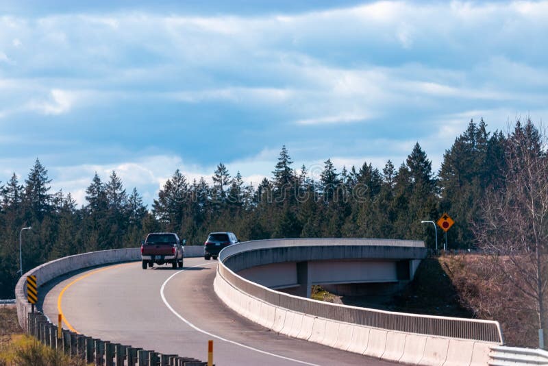 Cars Going Up Over an Interchange on a Freeway in Summer Stock Photo ...