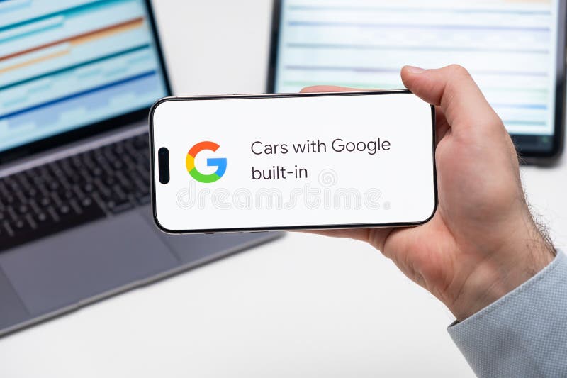 Cars with Google Built in Application Logo on the Screen of Smart Phone ...
