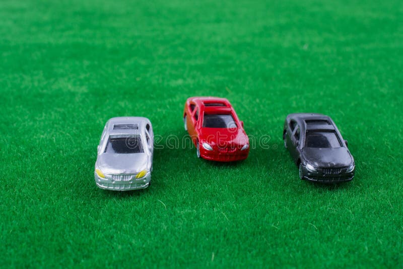 Cars on grass stock image. Image of model, vehicle, green - 70638727